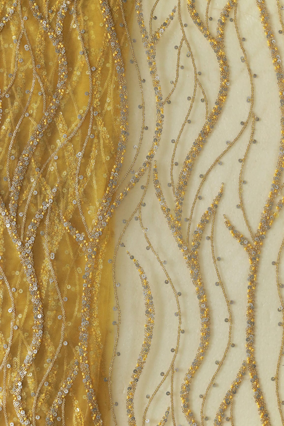Gold And Silver Sequins With yellow Thread Wavy Embroidery Work On yel