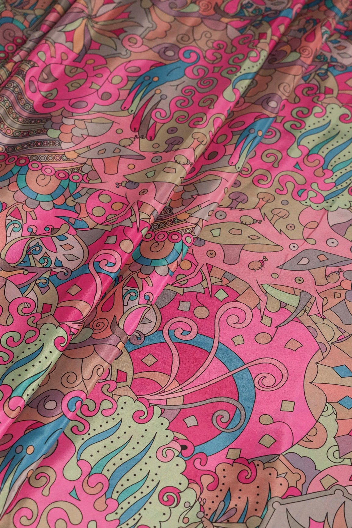 Multi Color Quirky Pattern Digital Print On Pink Crepe Fabric